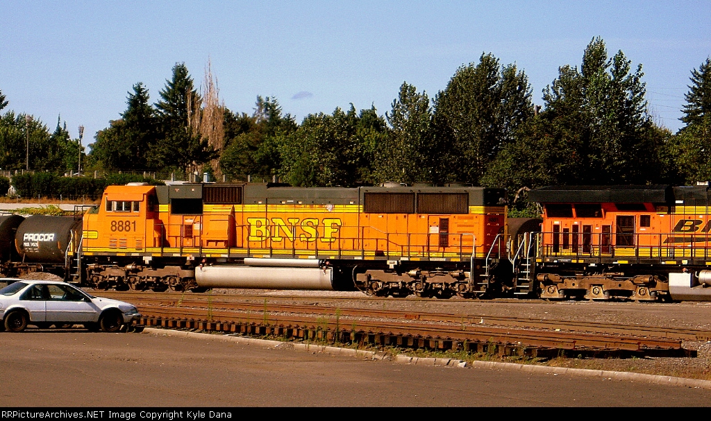 BNSF 8881 trails on a Grain train